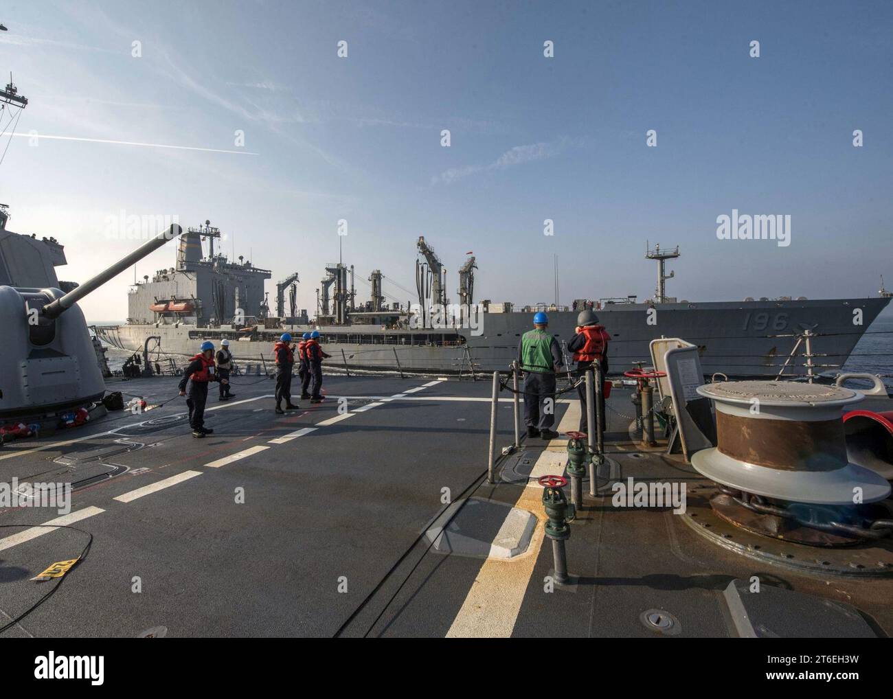 USS Mahan comes alongside USNS Kanawha during a replenishment at sea ...