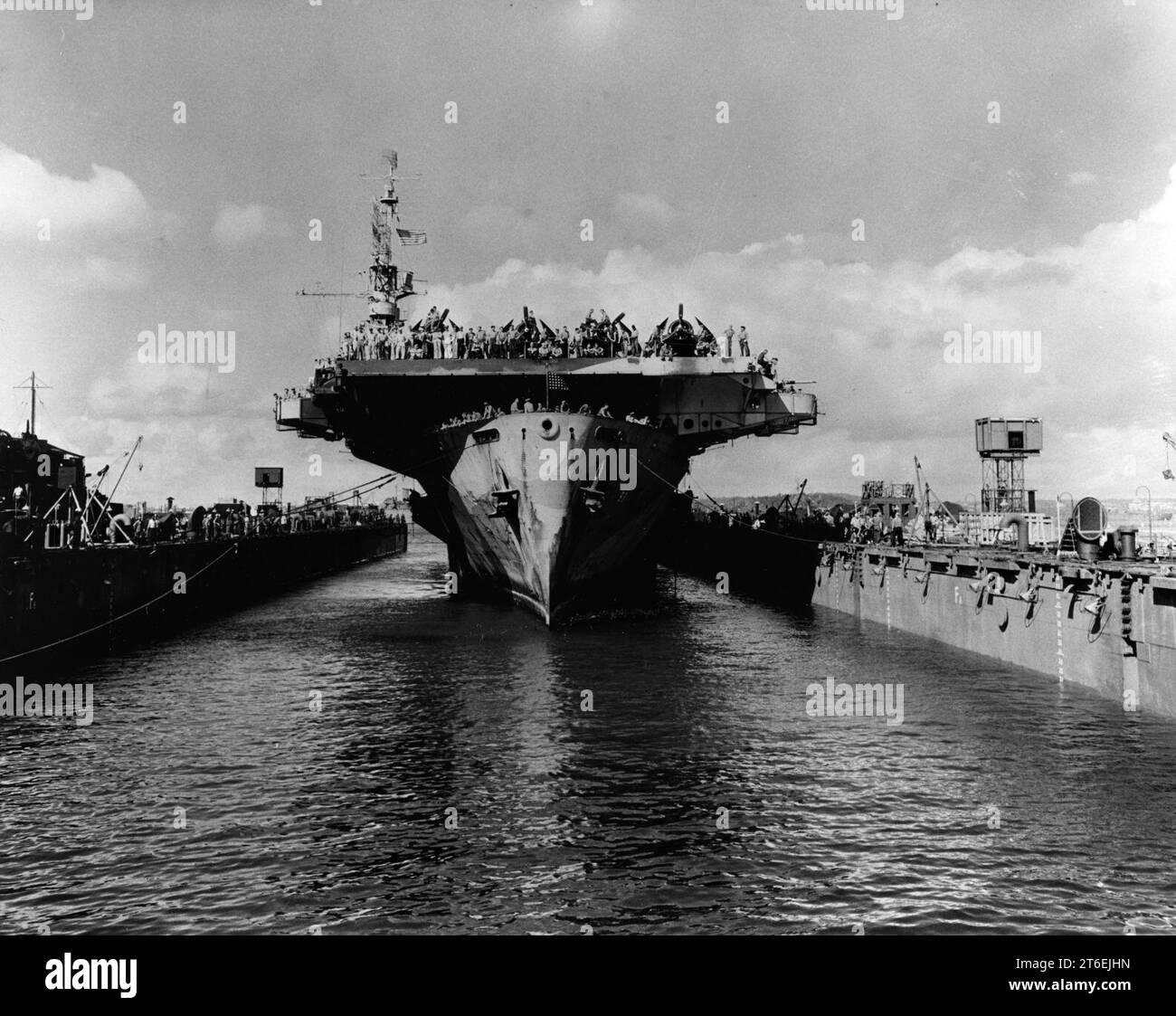 USS Makin Island (CVE-93) enters floating drydock ABSD-6 at Guam on 8 ...