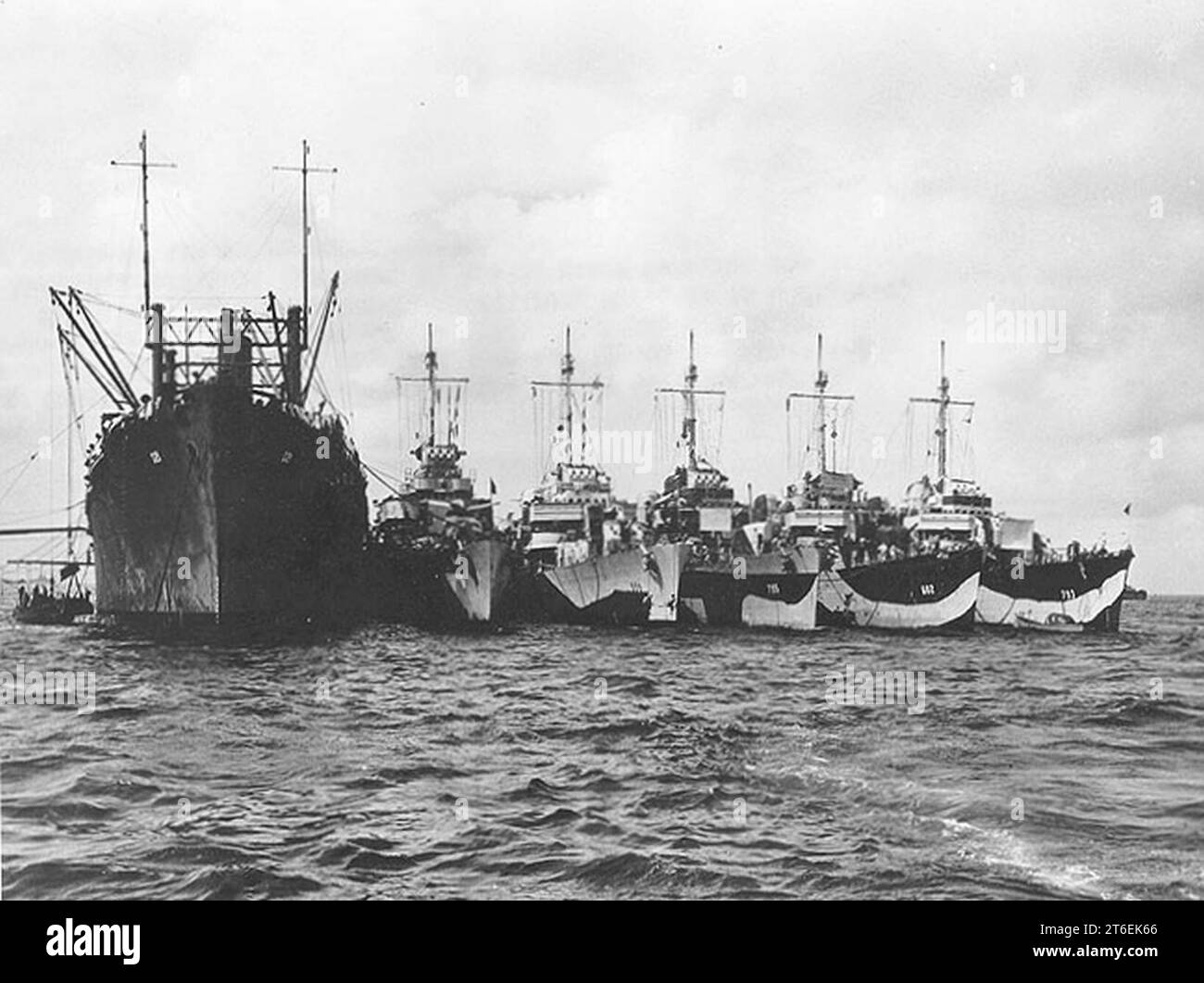 USS Markab (AD-21) with destroyers c1944 Stock Photo - Alamy