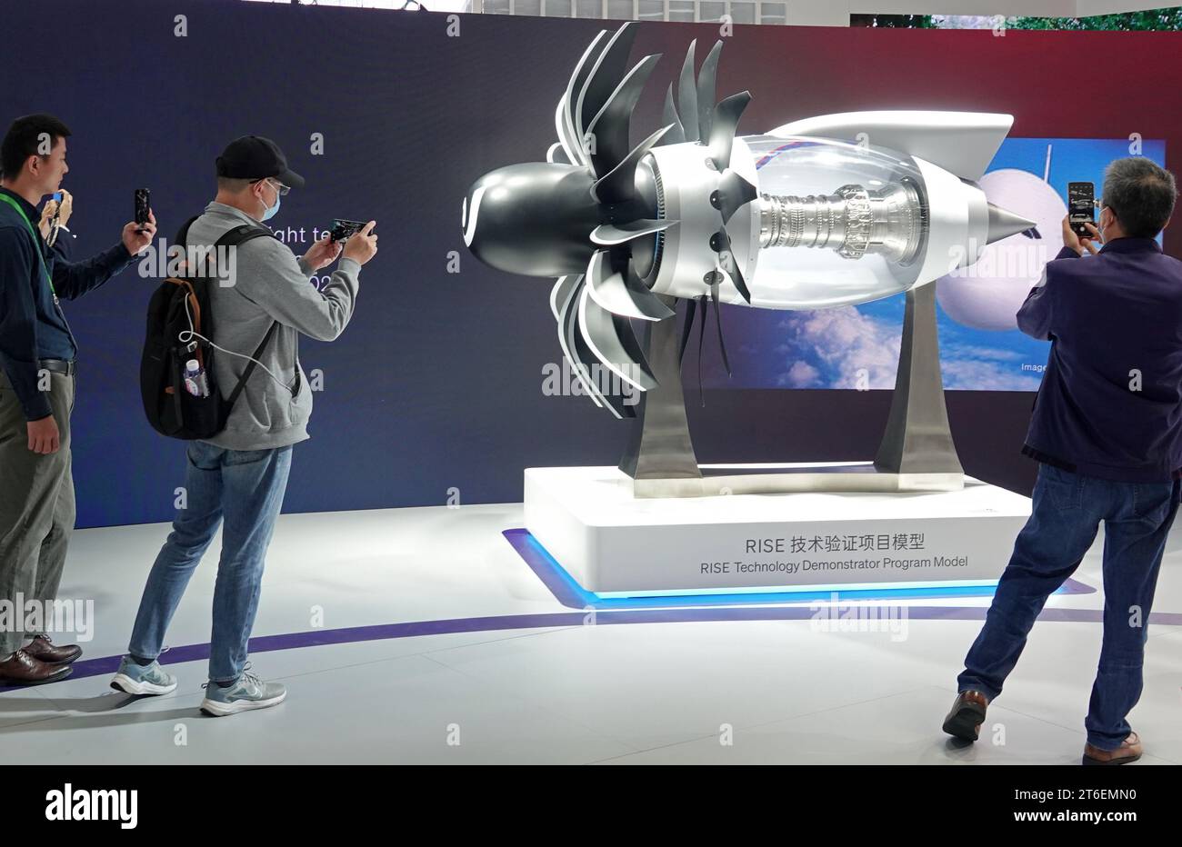 SHANGHAI, CHINA - NOVEMBER 8, 2023 - Visitors take photos of a model of ...