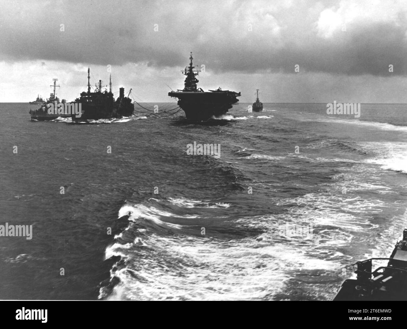 USS Merrimack (AO-37) refueling ships in July 1945 Stock Photo - Alamy