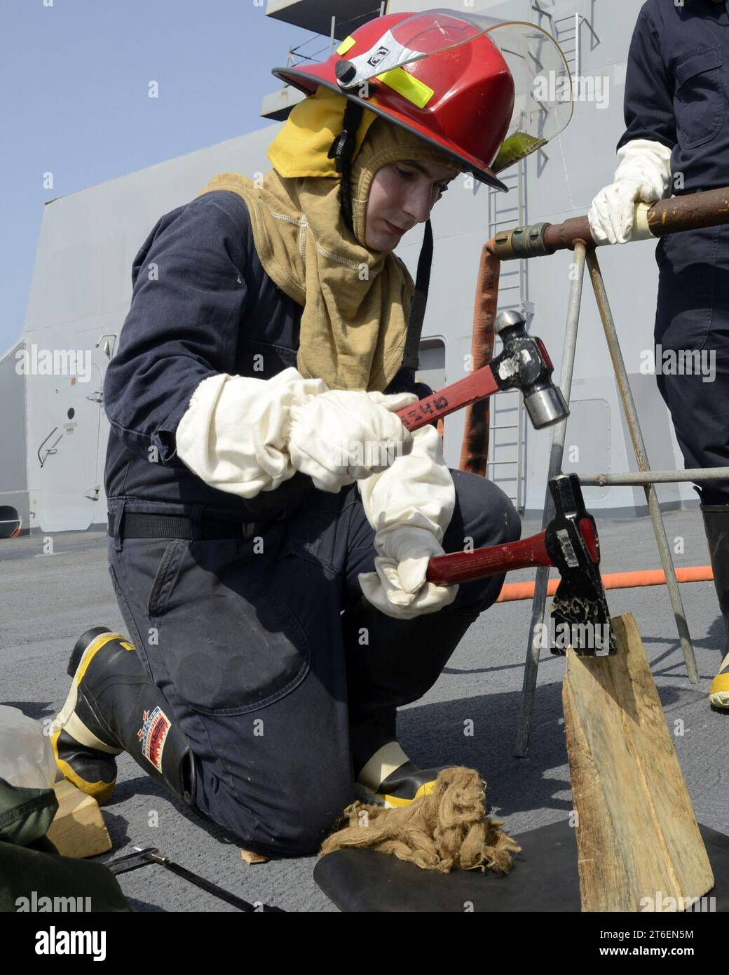 USS Mesa Verde general quarters drill 140327 Stock Photo - Alamy