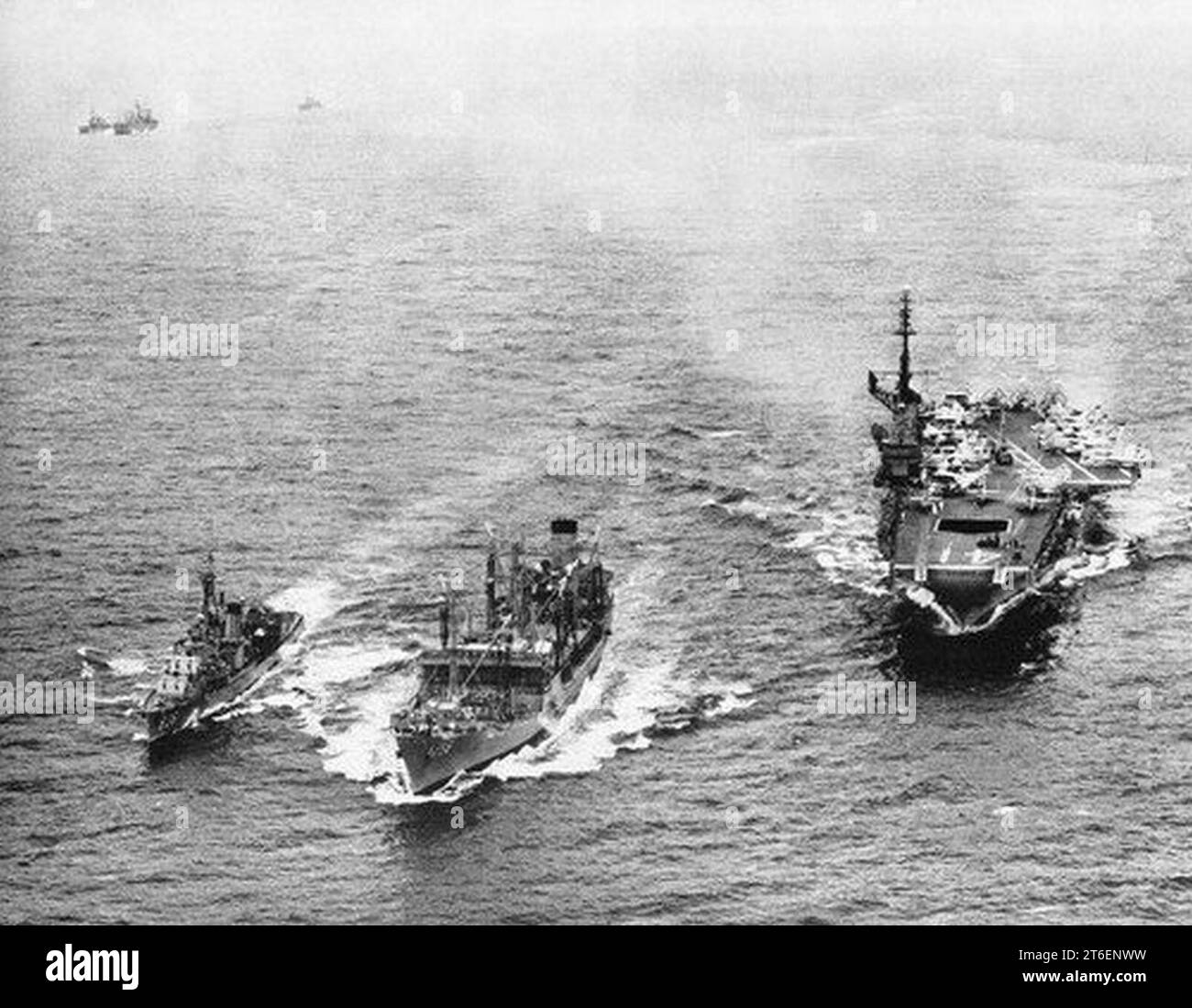 USS Midway (CVA-41) with oiler and destroyer in 1962 Stock Photo - Alamy
