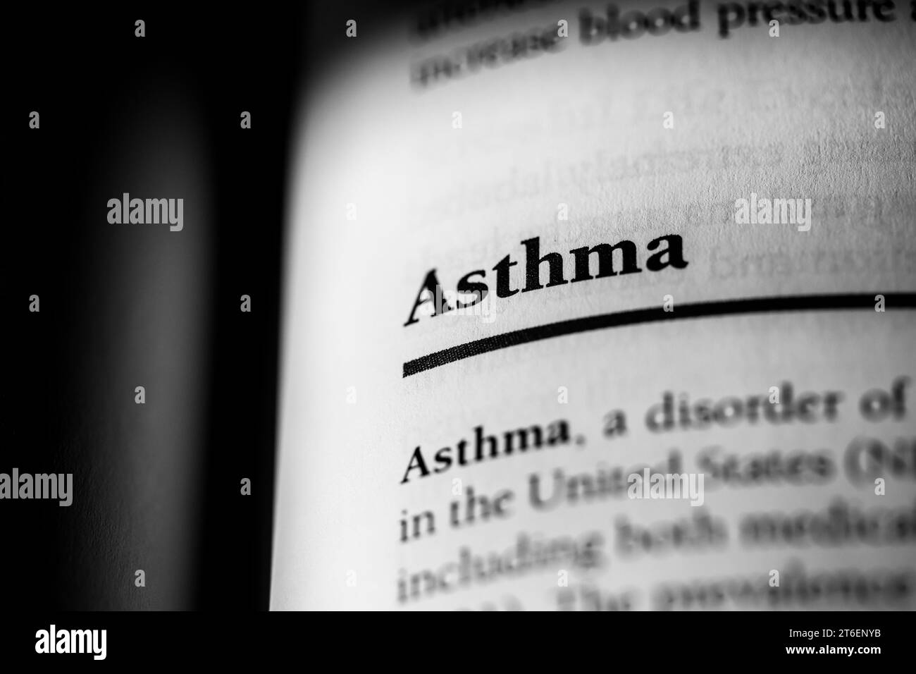 A close-up of the medical breathing disorder term asthma in black on ...
