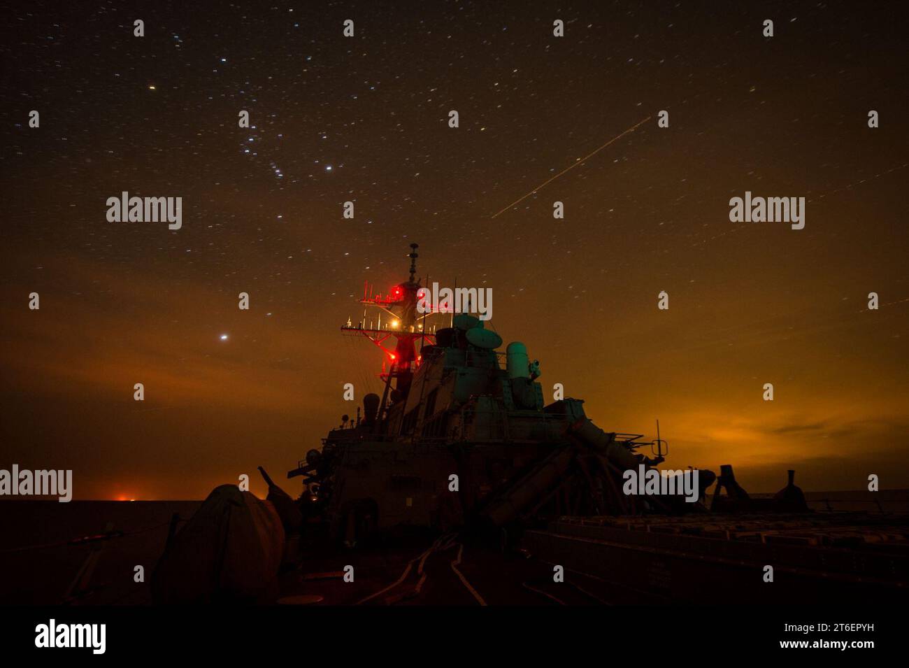 USS Mitscher (DDG 57) lights up its mast during night delayed landing ...