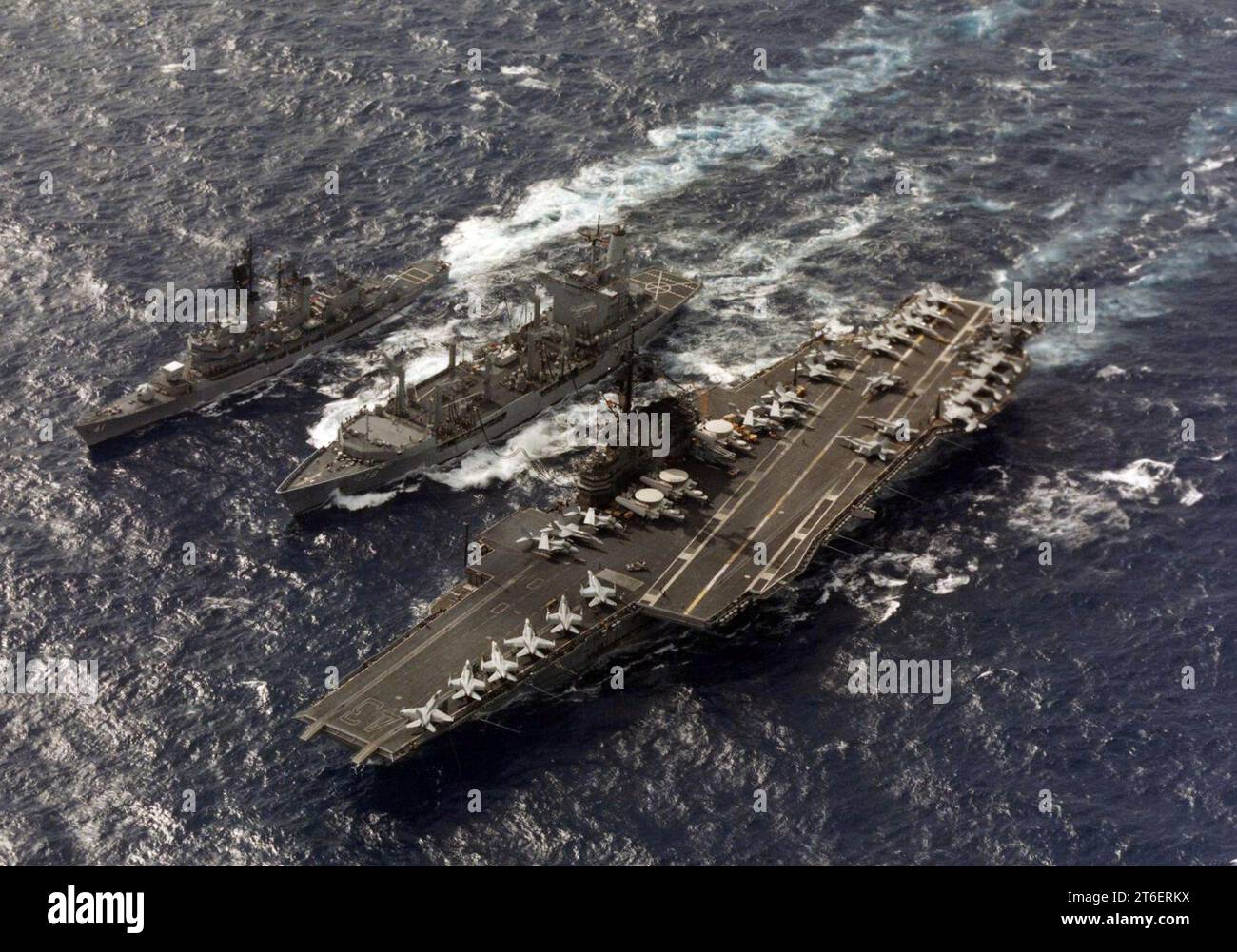 USS Monongahela (AO-178) refueling CV-43 and DDG-41 1989 Stock Photo ...
