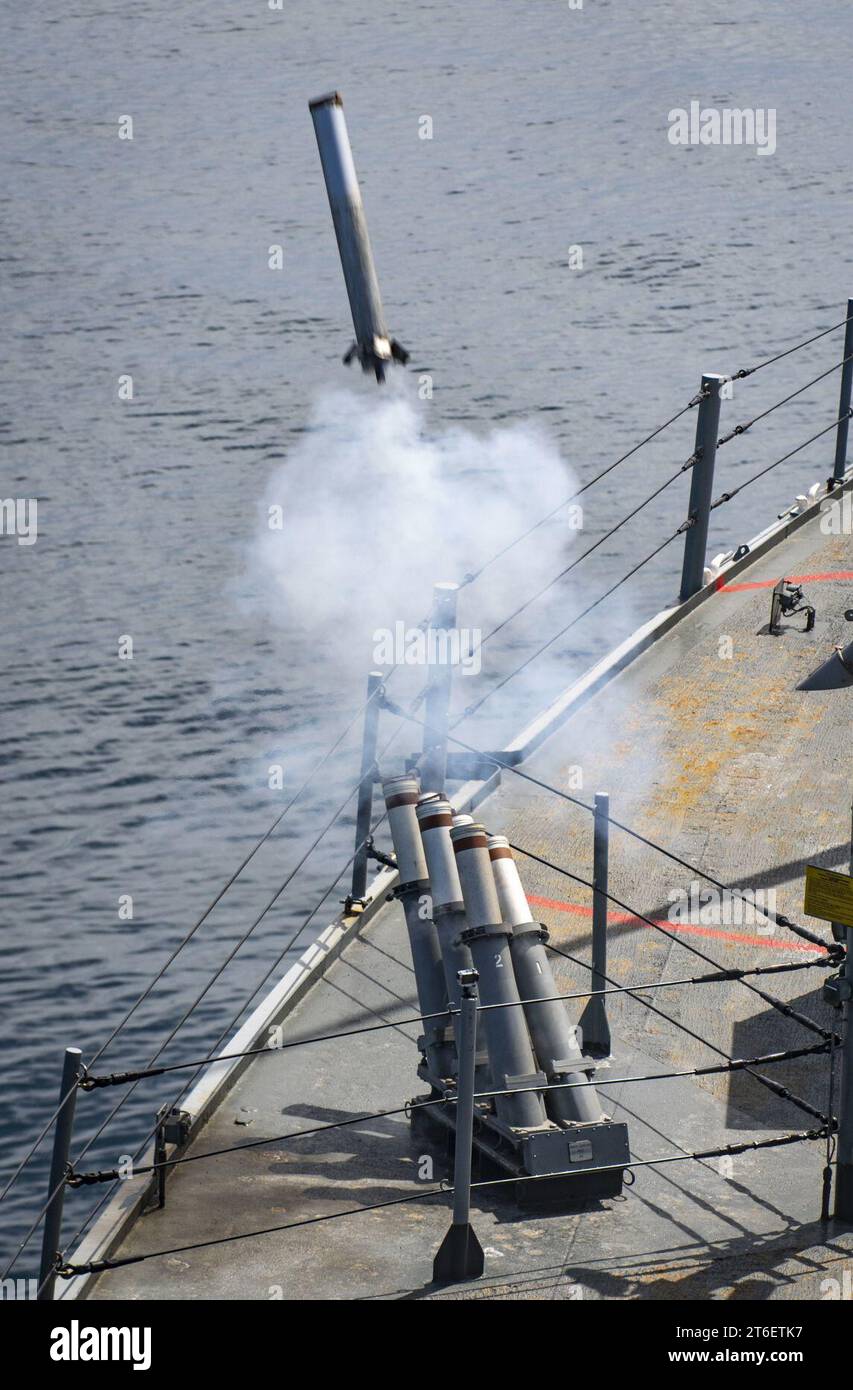 USS Mount Whitney (LCC-20) launches chaff from a Mk36 launcher while in ...