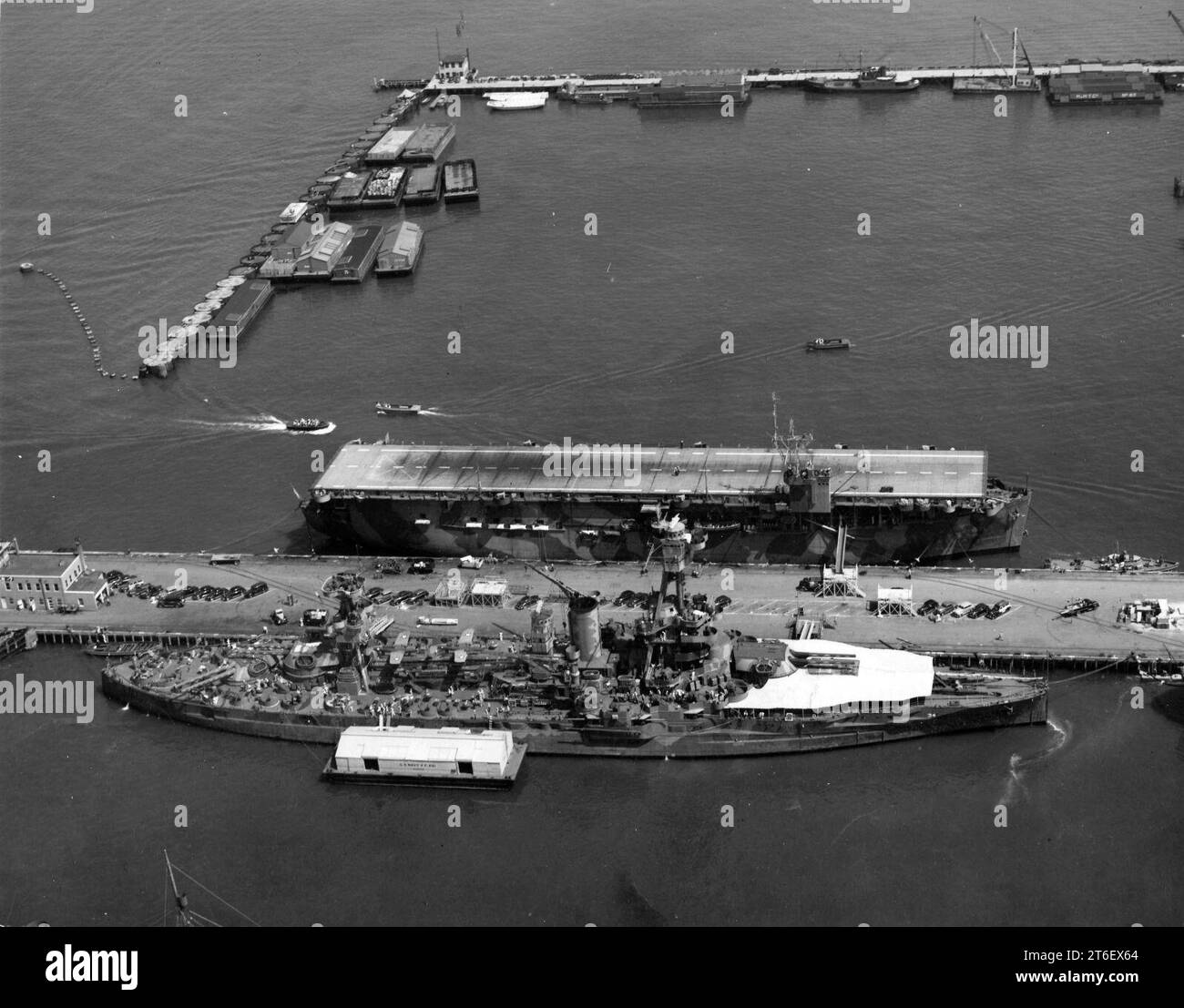 USS New York (BB-34)and USS Charger (ACV-30) at the Norfolk Naval ...