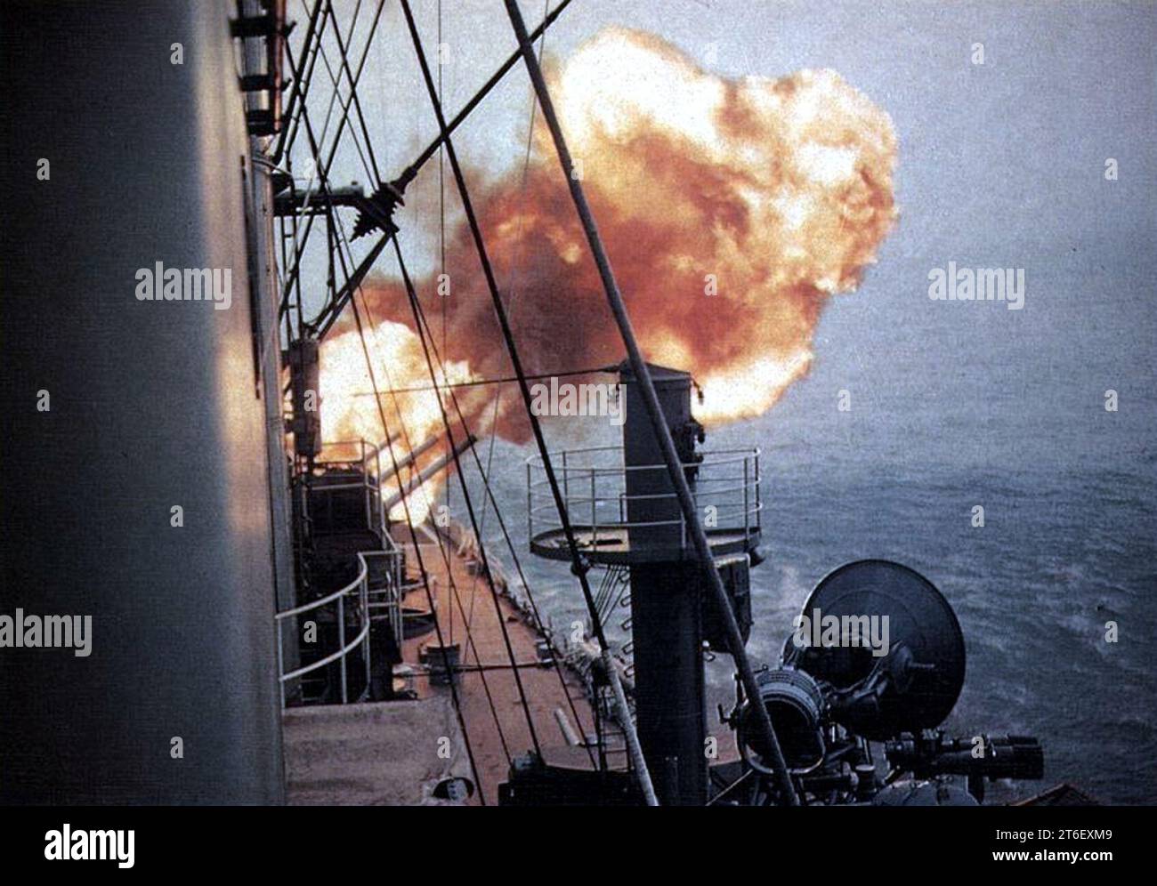USS Newport News (CA-148) firing on targets in Vietnam, circa in 1967 ...