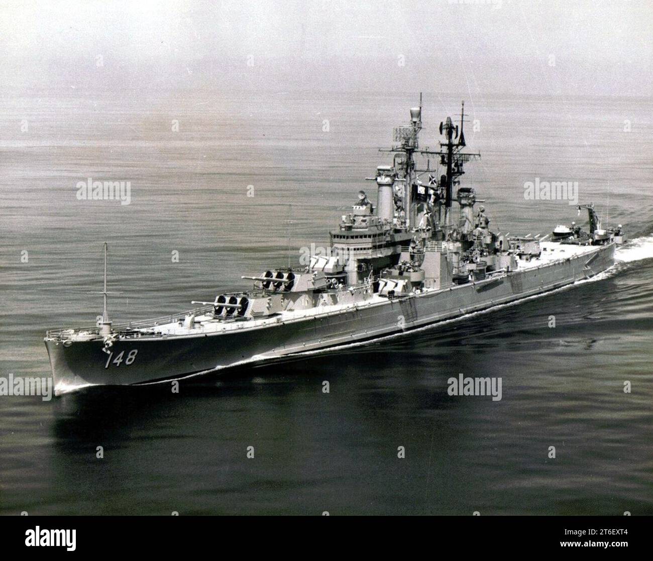 USS Newport News (CA-148) underway in the Atlantic Ocean, in August ...