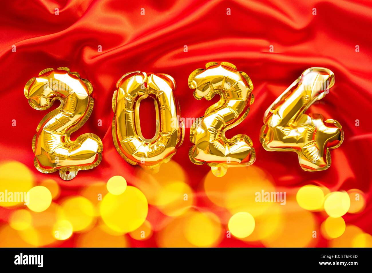 Foil balloons in the form of numbers 2024, New year celebration, Gold ...