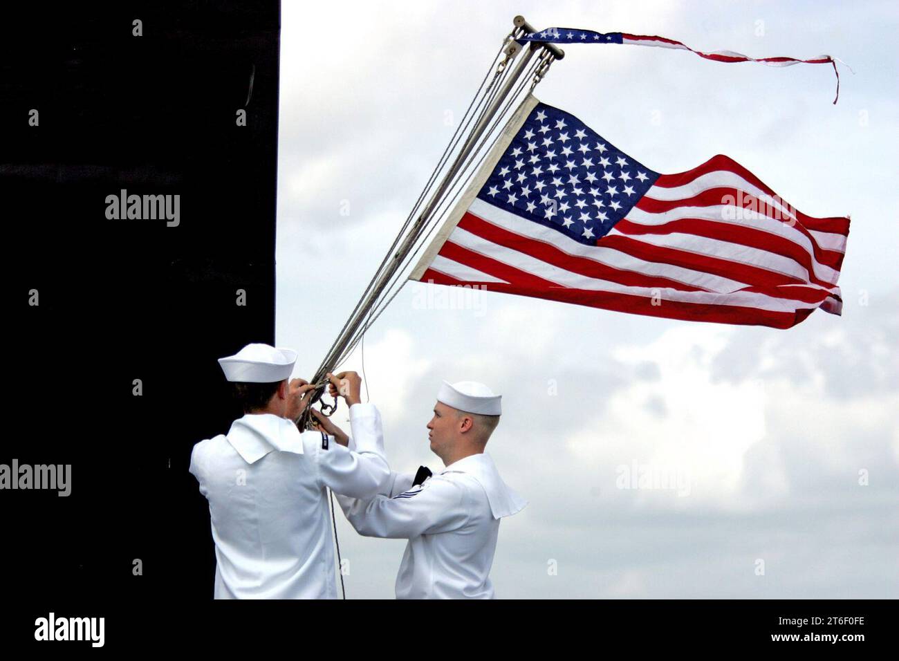 USS North Carolina (SSN-777) breaks the commissioning pennant Stock ...