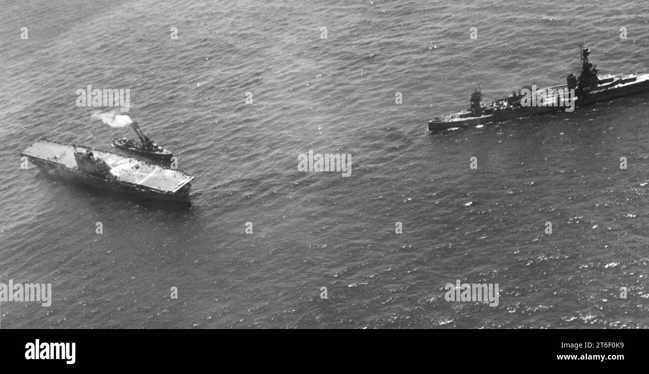 USS Northampton (CA-26) standing by the damaged USS Hornet (CV-8 ...