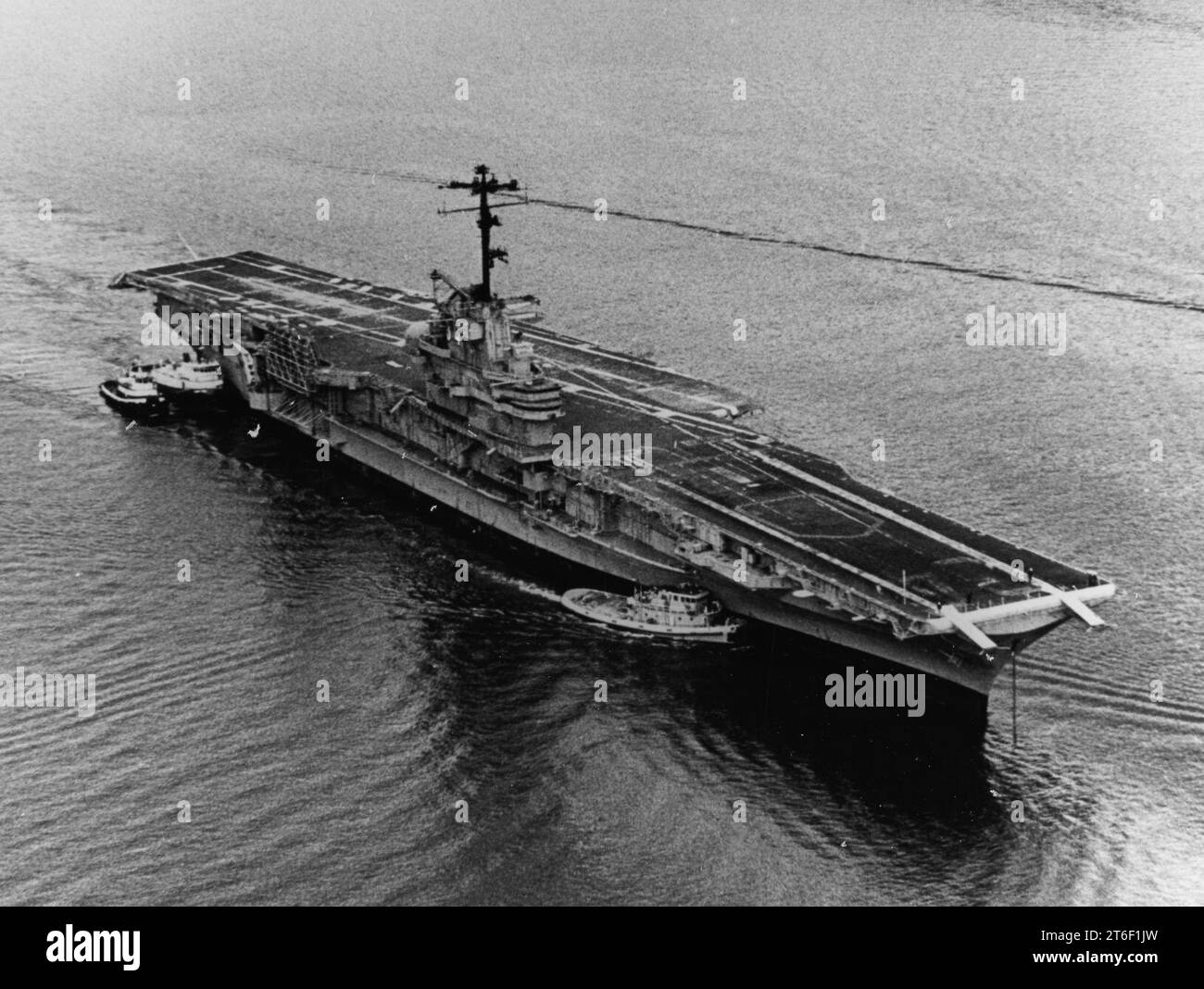 USS Oriskany (CV-34) being towed to Bremerton in October 1976 Stock ...