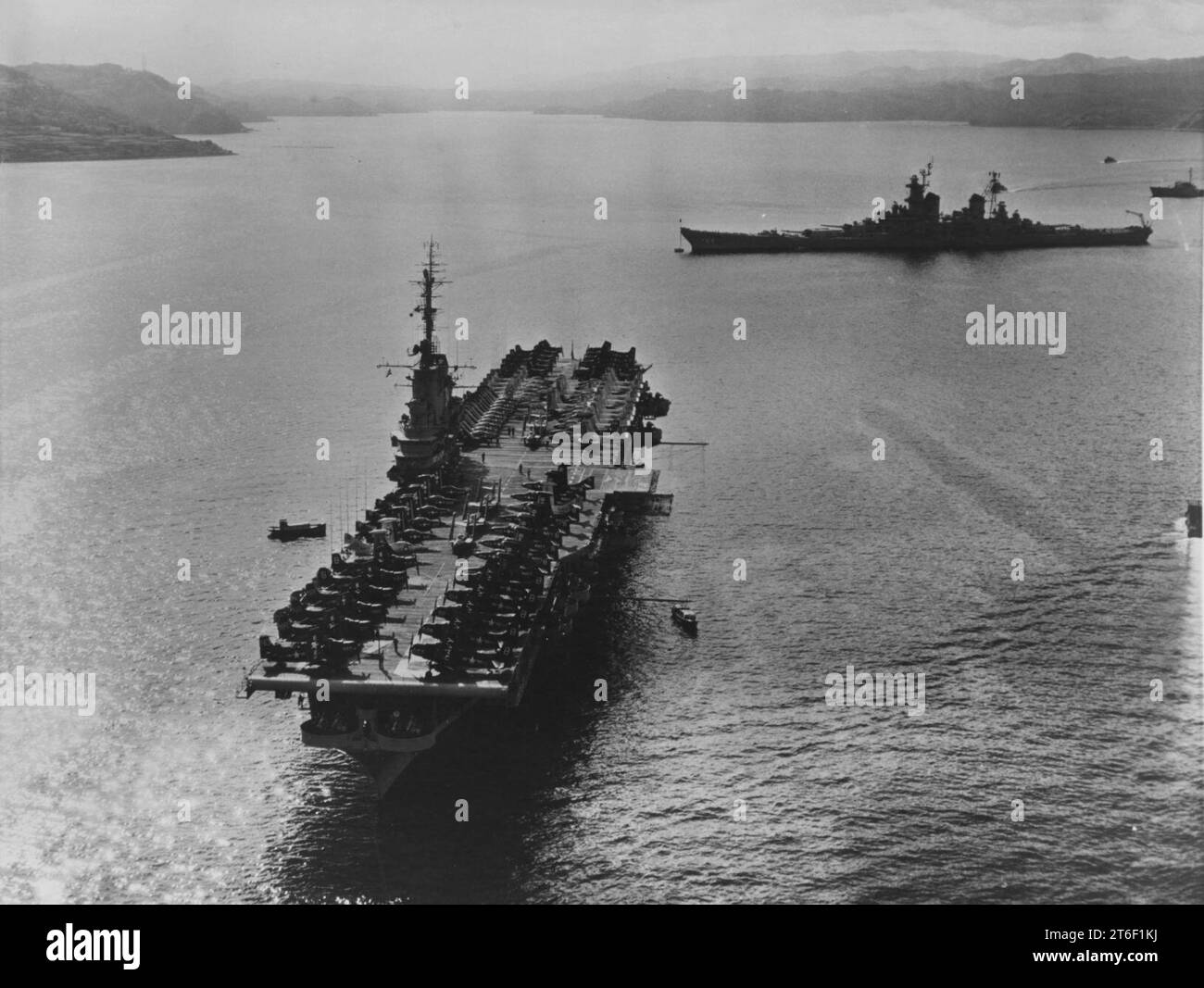 USS Oriskany (CVA-34) and USS Wisconsin (BB-64) at Sasebo in October ...