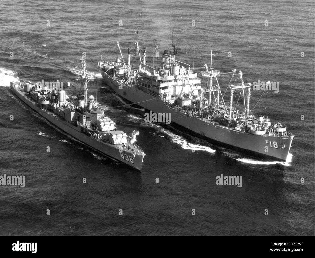 USS Paricutin (AE-18) replenishing USS George K. MacKenzie (DD-836) in ...