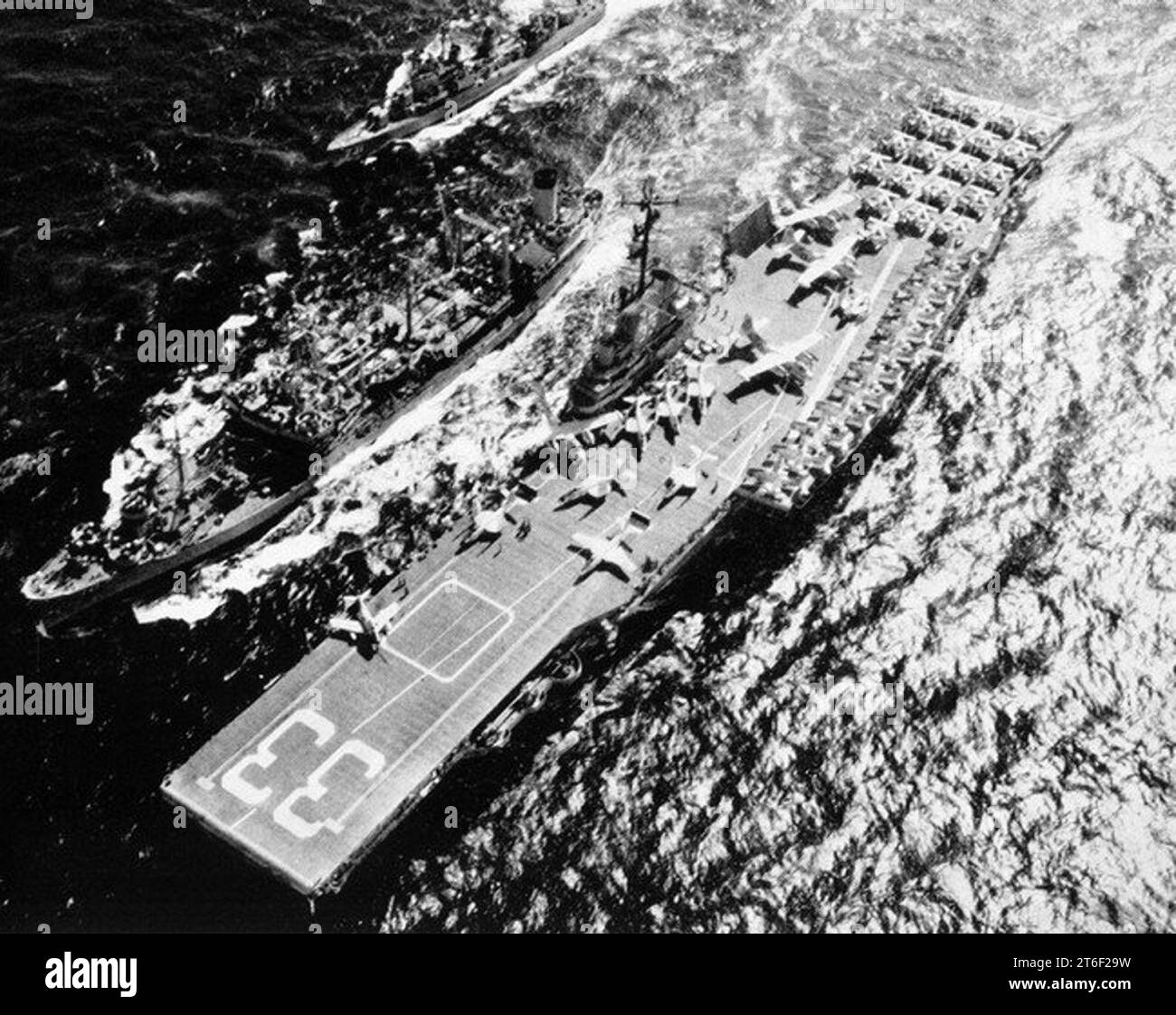 USS Passumpsic (AO-107) refuels USS Kearsarge (CVA-33) and USS Maddox ...