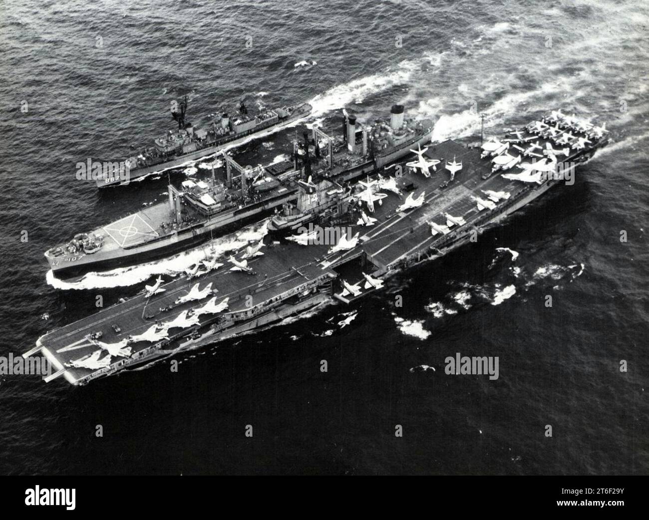 USS Passumpsic (AO-107) refueling USS Ticonderoga (CVA-14) and USS ...