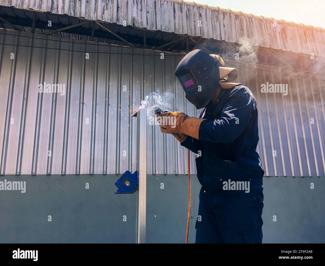 Welding Metal, Man welding steel blurred background, Welder concept ...