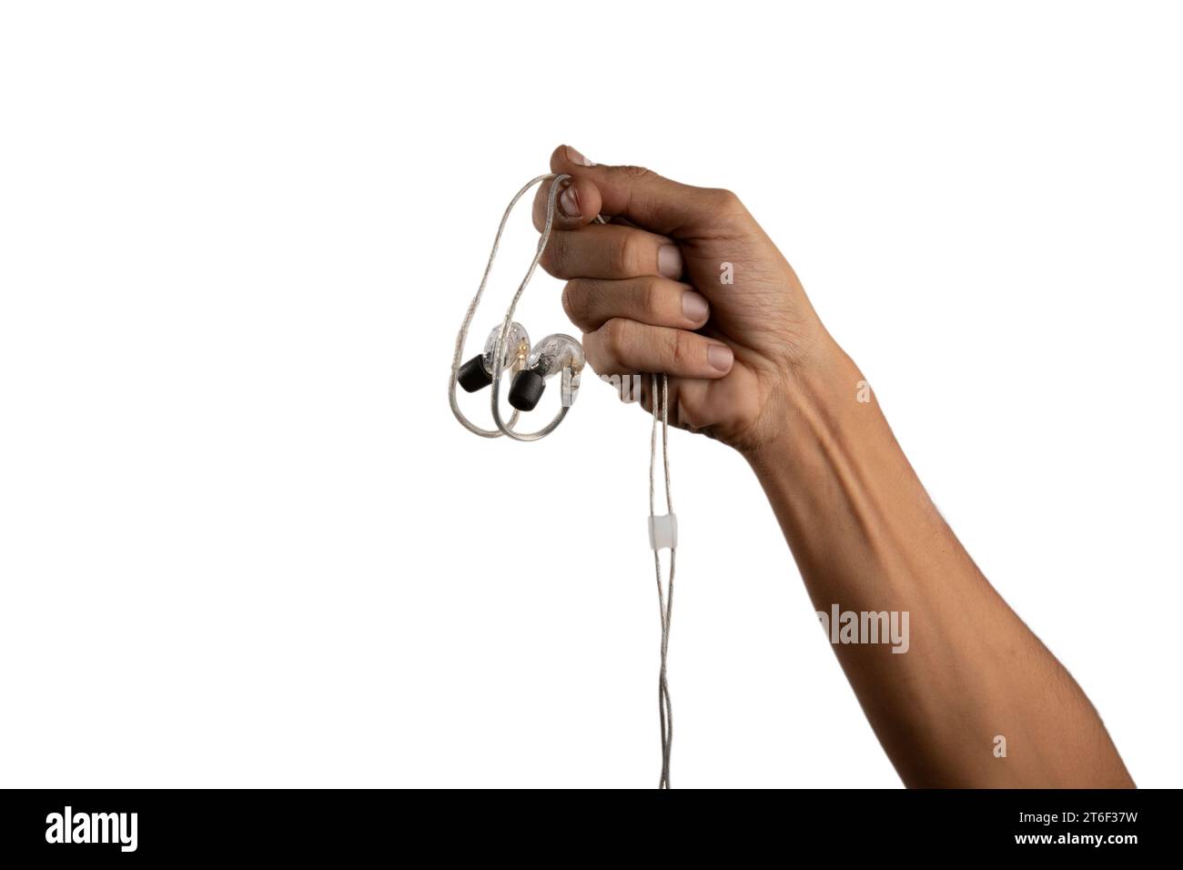 Hand holding ear buds Cut Out Stock Images & Pictures - Alamy