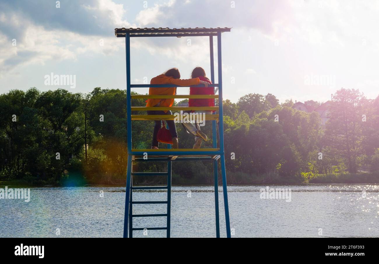 Rescue tower on the river. Observation tower. Observers. Rescuers ...