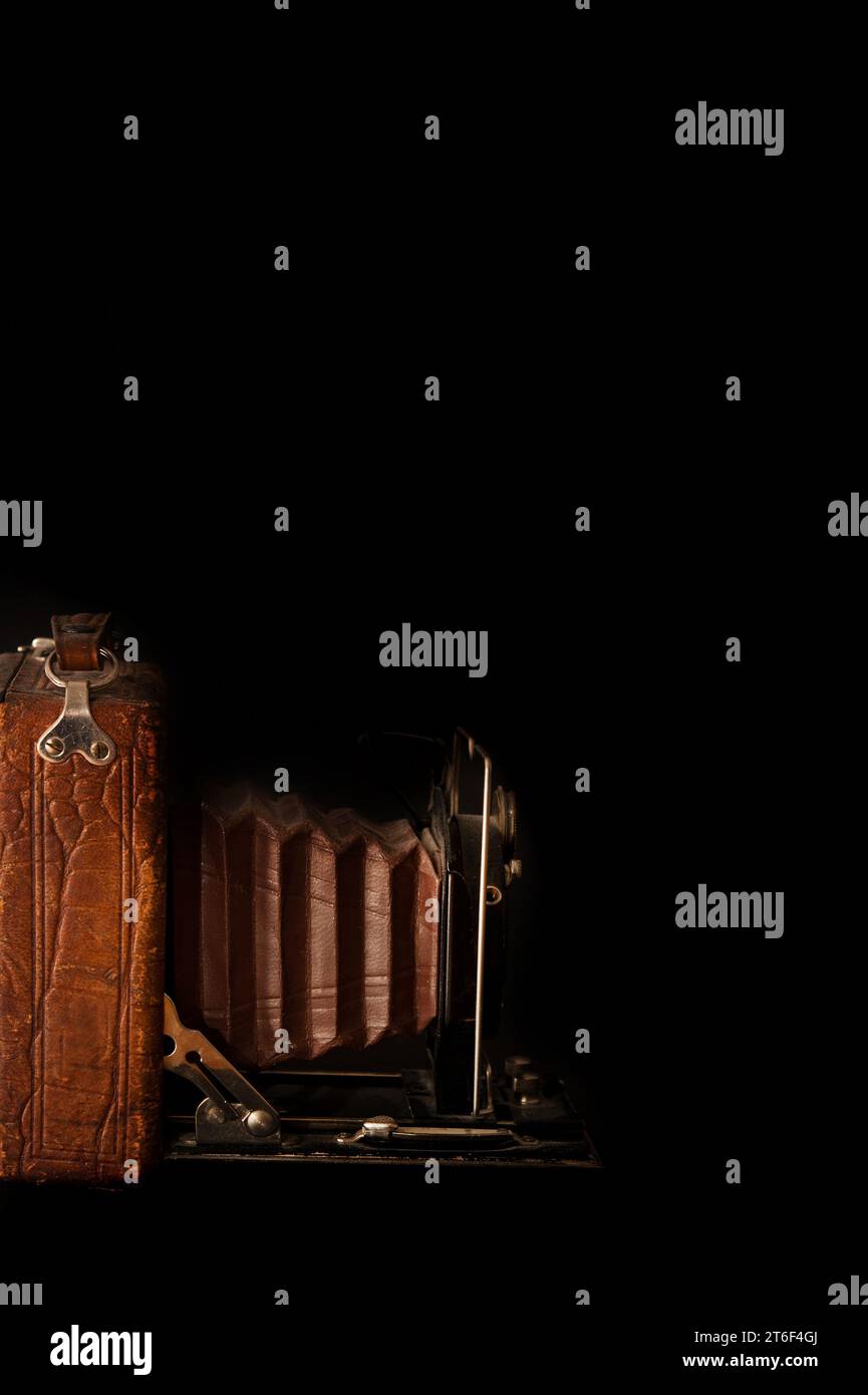 antique bellow photo camera, studio shot over black background Stock ...