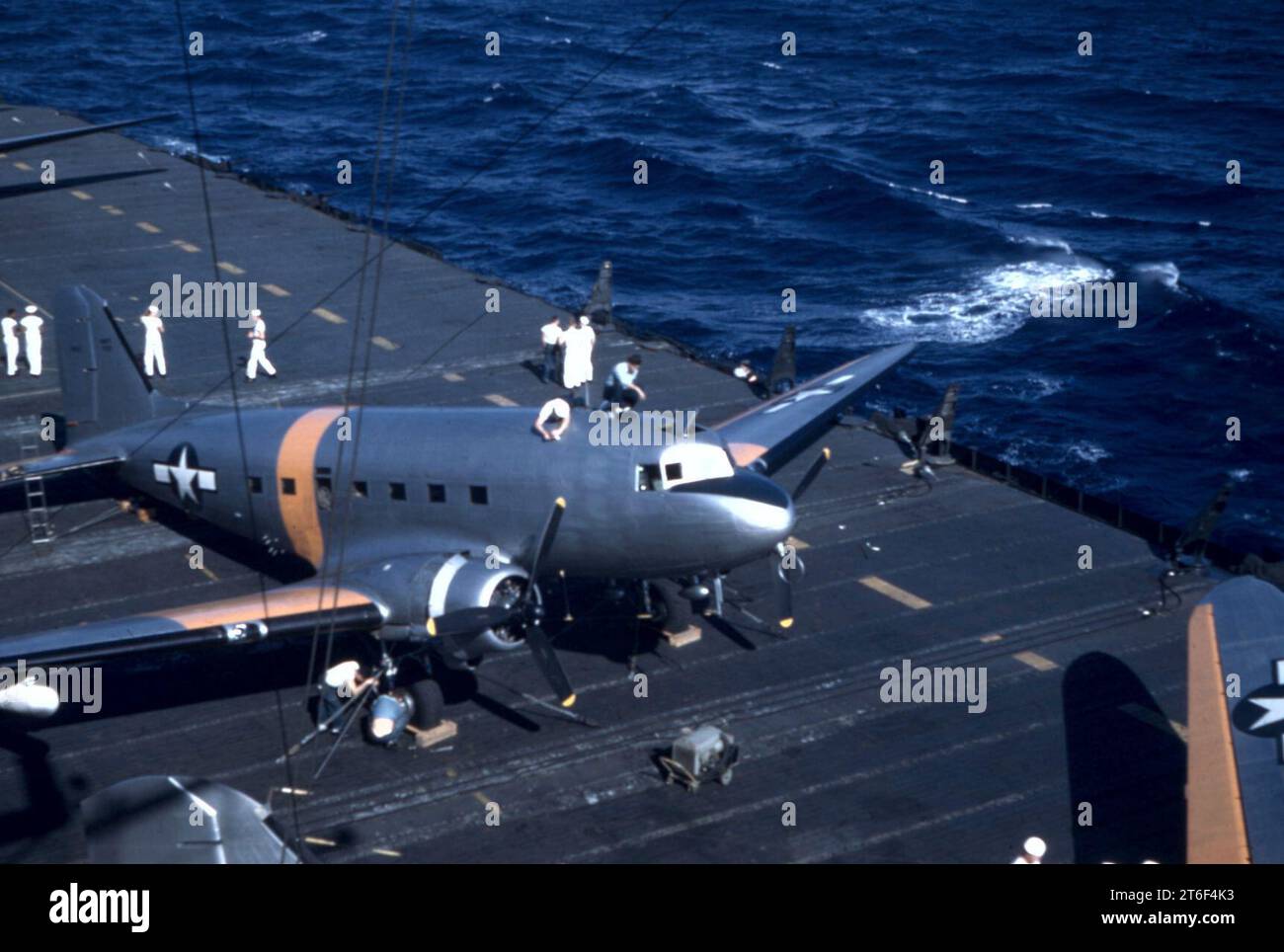 USS Philippine Sea (CV-47) transporting Douglas R4D aircraft to ...