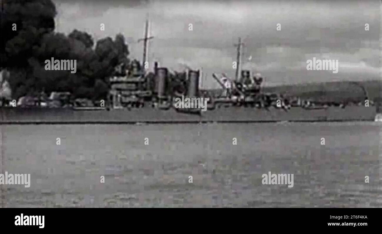 USS Phoenix (CL-46) steams down the channel at Pearl Harbor on 7 ...