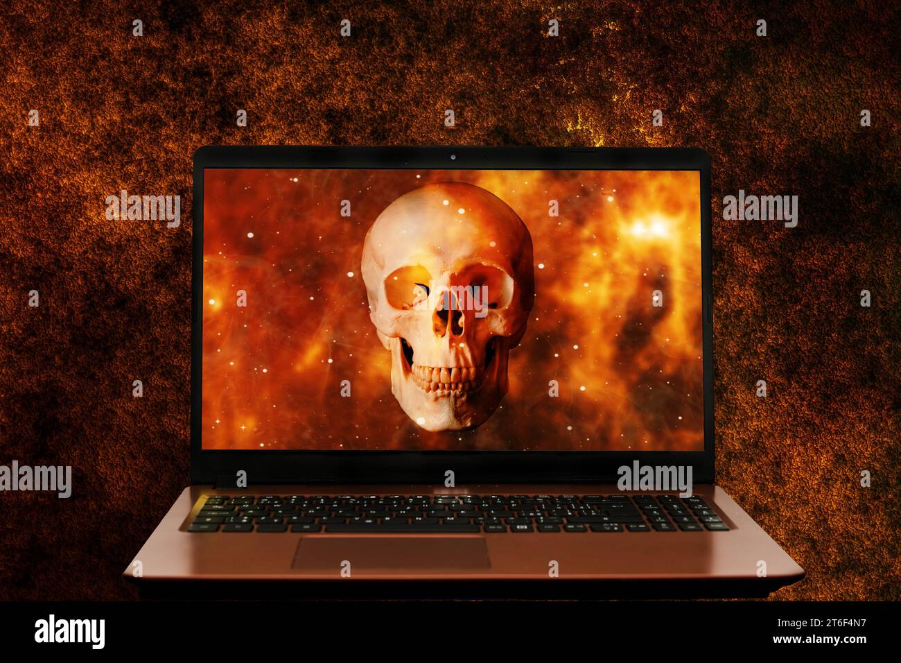 laptop with a human skull on screen, dangers in internet, dark web ...