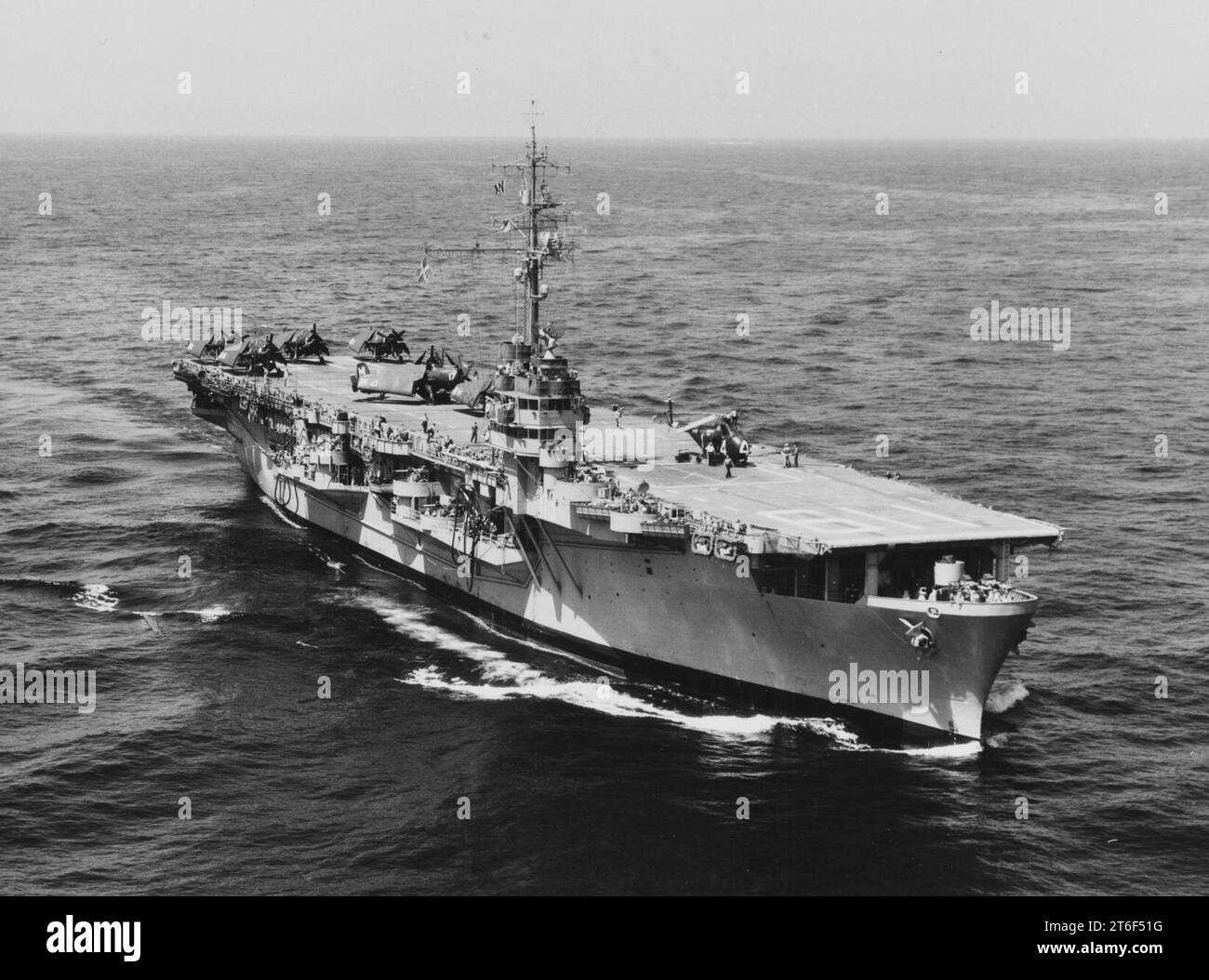 USS Point Cruz (CVE-119) underway at sea east of Japan in July 1953 ...