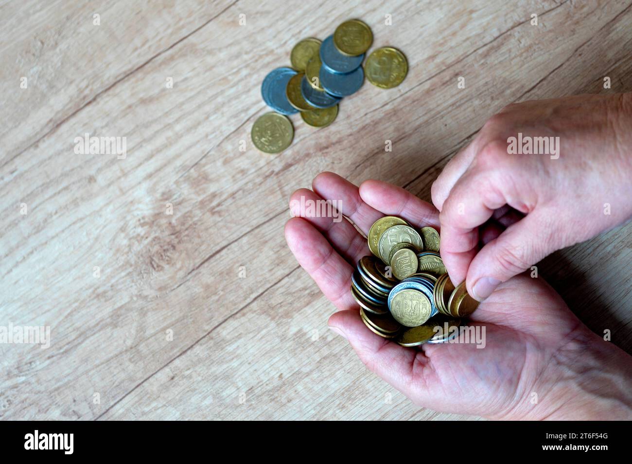 Coins in the palms. Counting money, coins. Poverty concept, cash ...