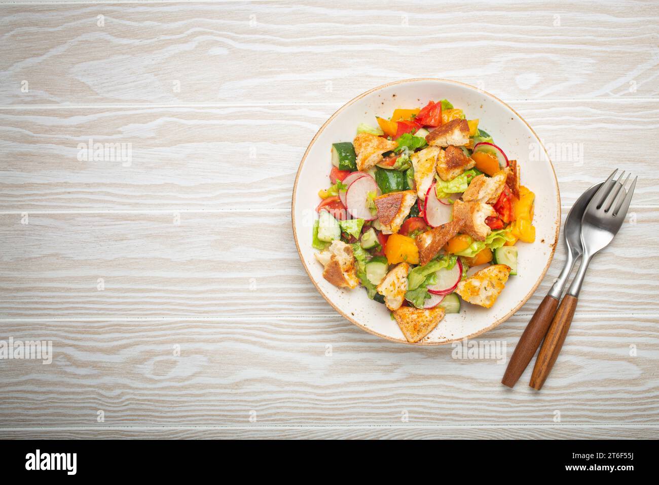Traditional Levant dish Fattoush salad, Arab cuisine, with pita bread ...