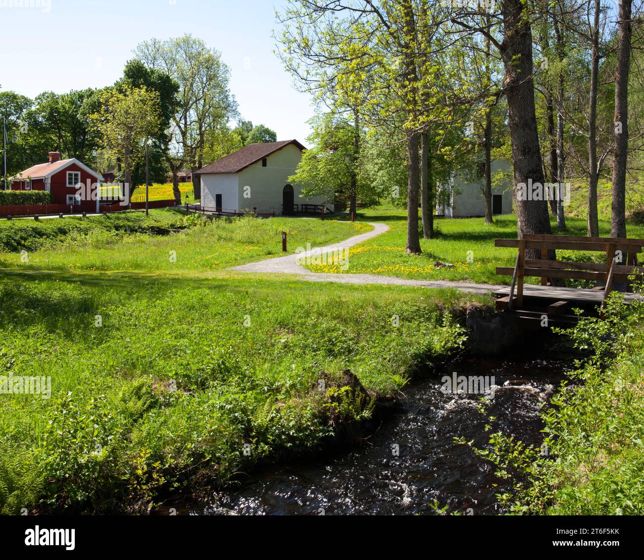 The white building where the water wheel and power transmission at the ...