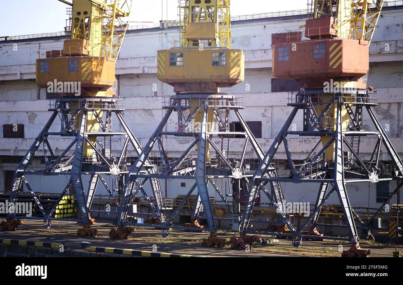 Port Cranes on a Pier of Seaport. Industrial freight.Container terminal ...