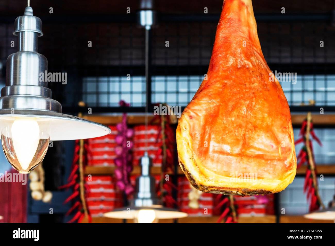 Dried and jerky meat. Jamón hang . Butcher shop. Jamón and smoked ...