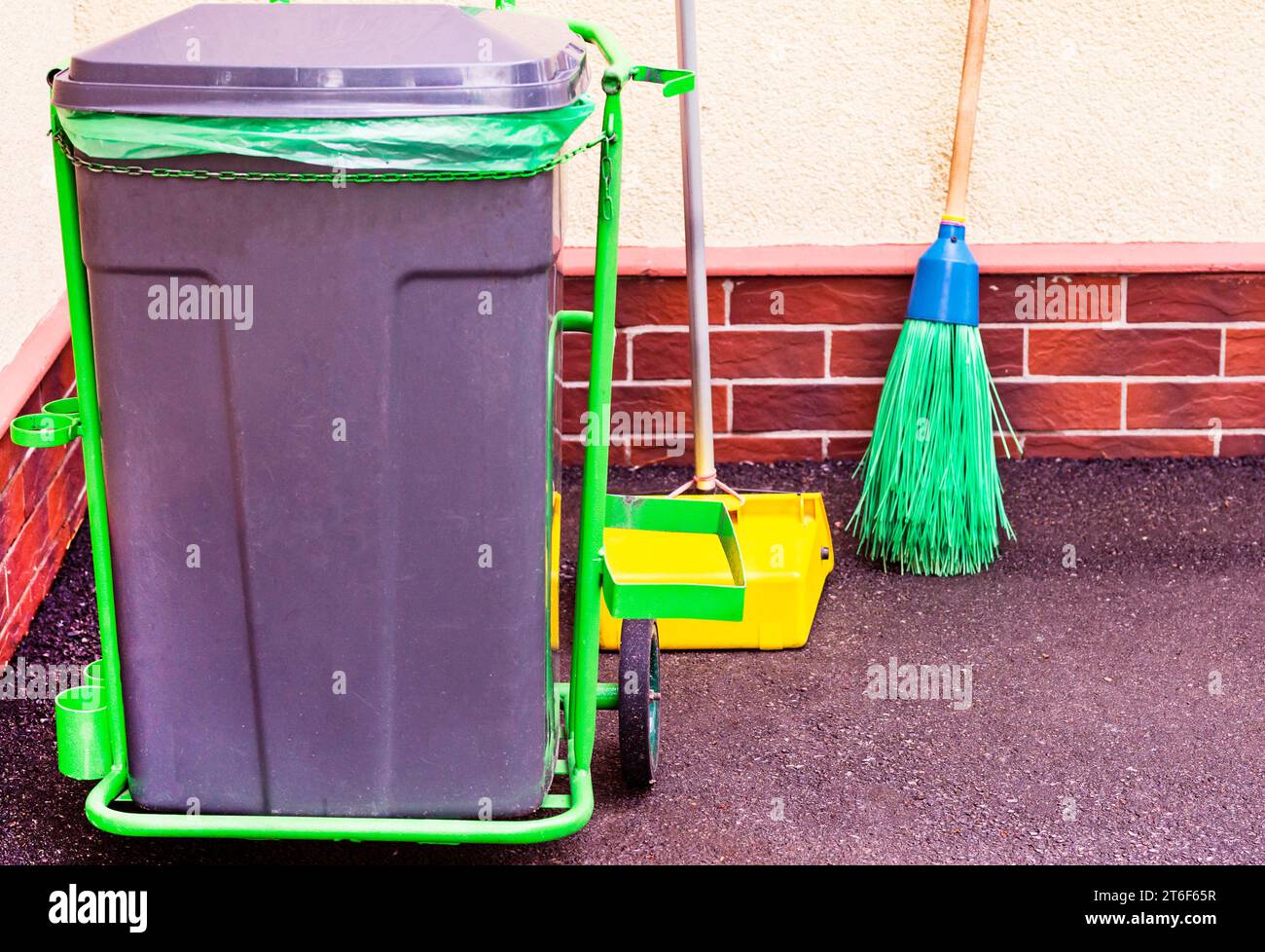 Broom and scoop for cleaning of garbage on the street. The concept ...