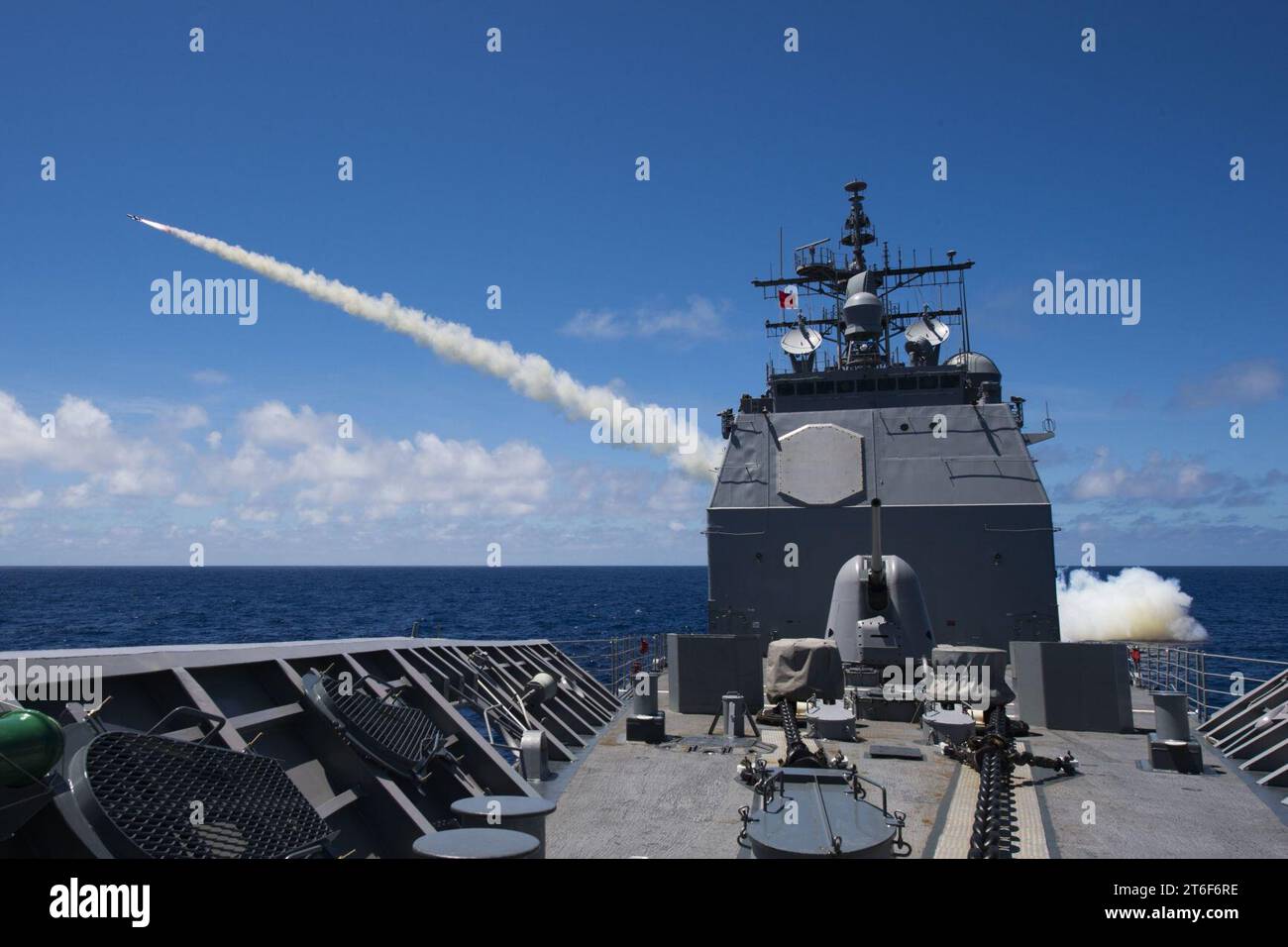 USS Princeton (CG 59) fires an RGM-84 Harpoon anti-ship missile during ...