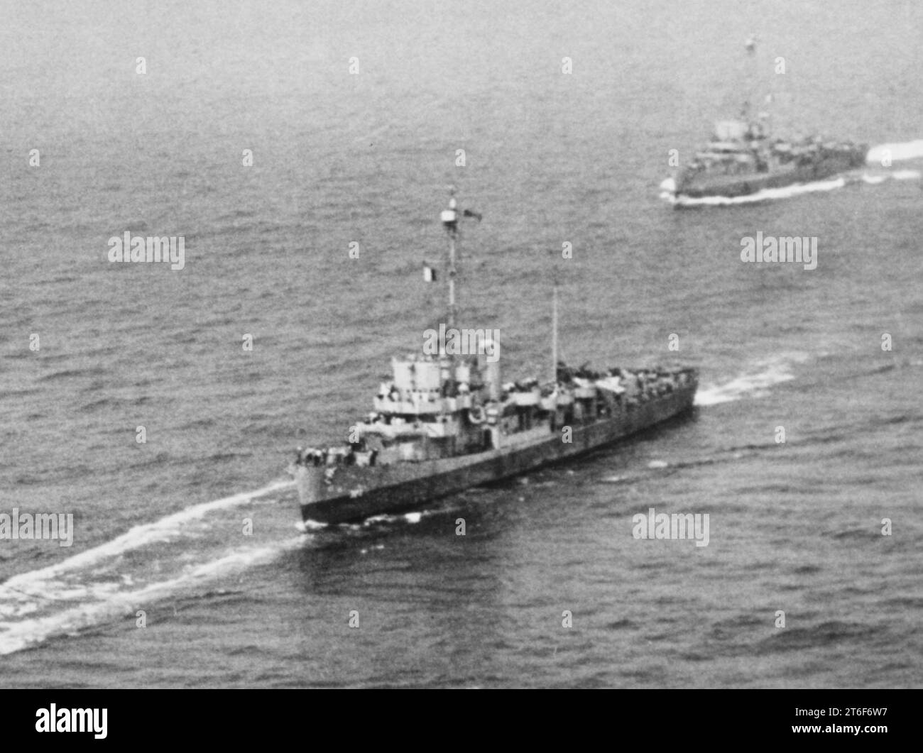 USS Pride (DE-323) and USS Newell (DE-322) underway at sea on 17 August ...