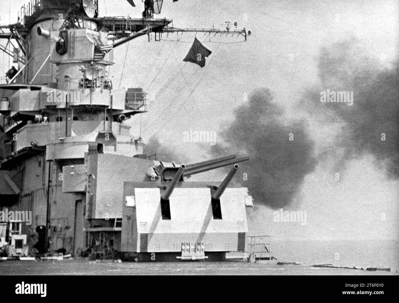 USS Princeton (LPH-5) firing its aft 127 mm turrets, in 1960 Stock ...