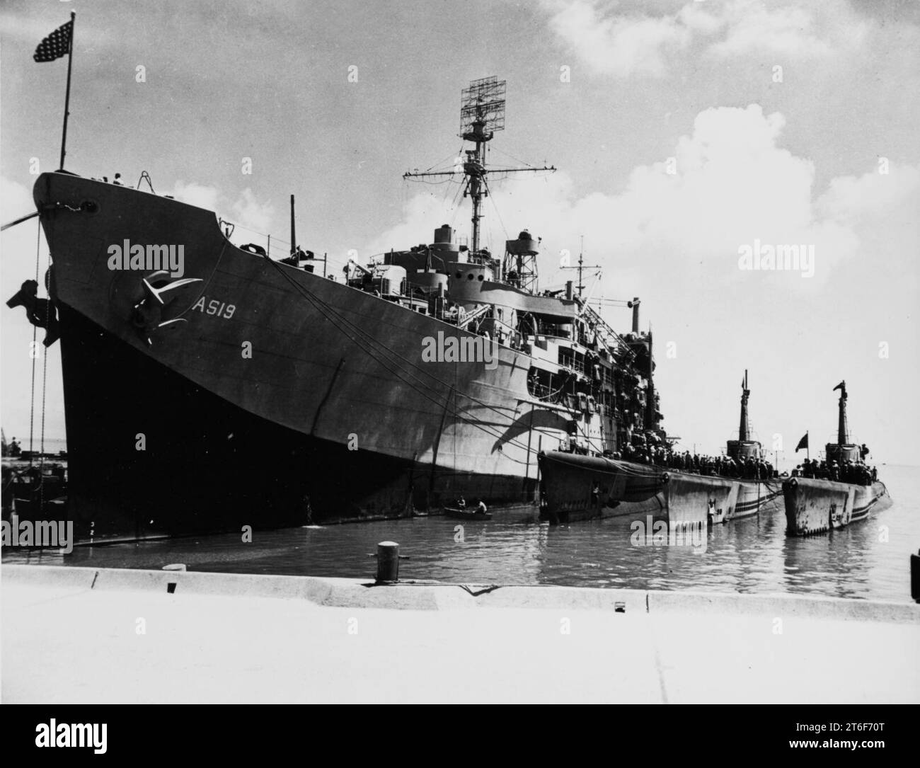 USS Proteus (AS-19) with USS Bang (SS-385), USS Pintado (SS-387) and ...