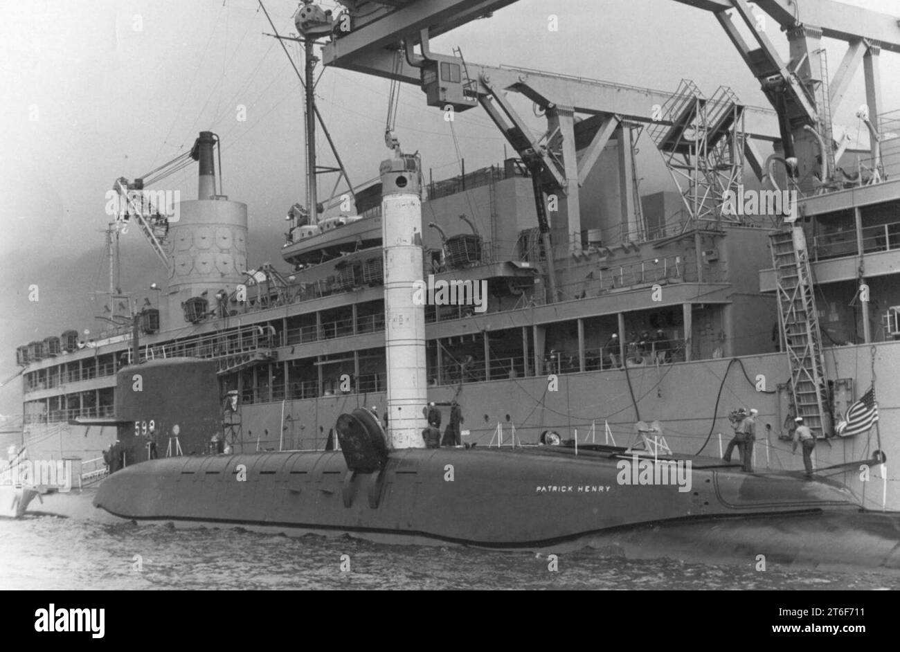 USS Proteus (AS-19) loads Polaris missile onto USS Patrick Henry (SSBM ...