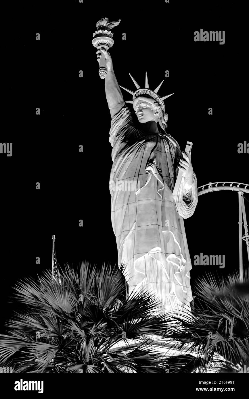 An iconic Statue of Liberty standing proudly against a backdrop of a ...