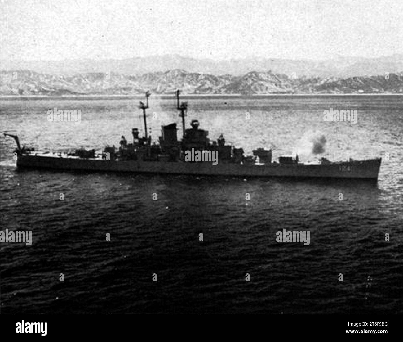 USS Rochester (CA-124) firing on targets in Korea, circa in 1952 Stock ...