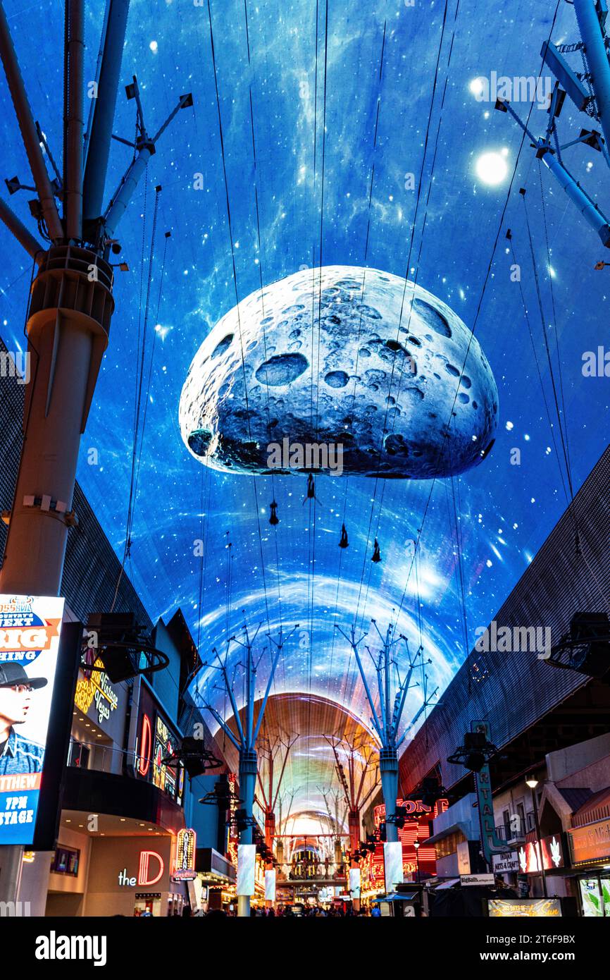 A modern interior featuring a ceiling decorated with a celestial ...