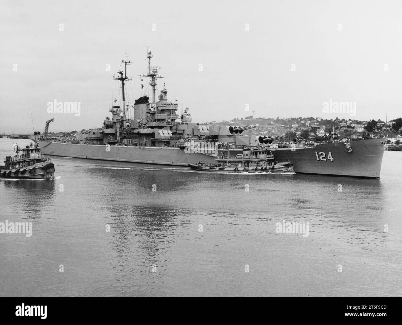 USS Rochester (CA-124) with tugs at the Mare Island Naval Shipyard on ...