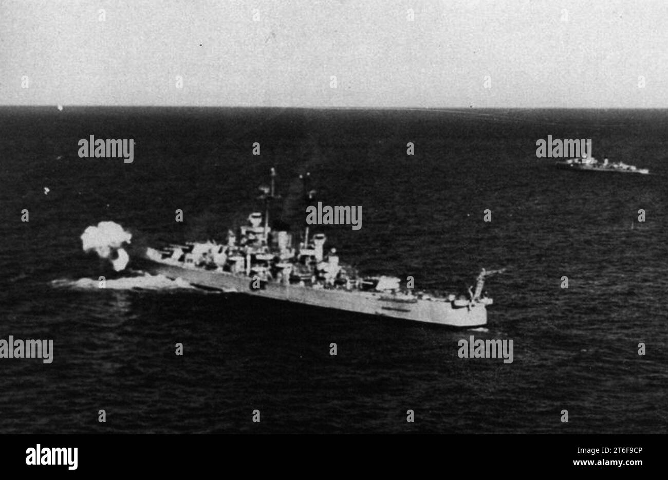USS Rochester (CA-124) shelling targets in Korea, circa in 1953 Stock ...