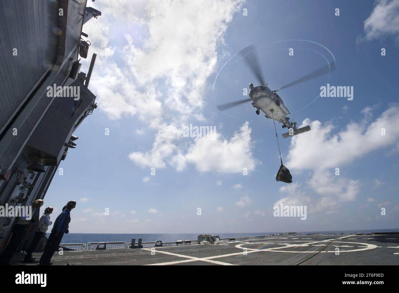 USS Rodney M. Davis flight deck operations with HSM-51 140916 Stock ...