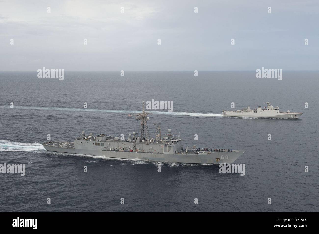 USS Rodney M. Davis (FFG-60) with Indonesian corvette KRI Sultan ...