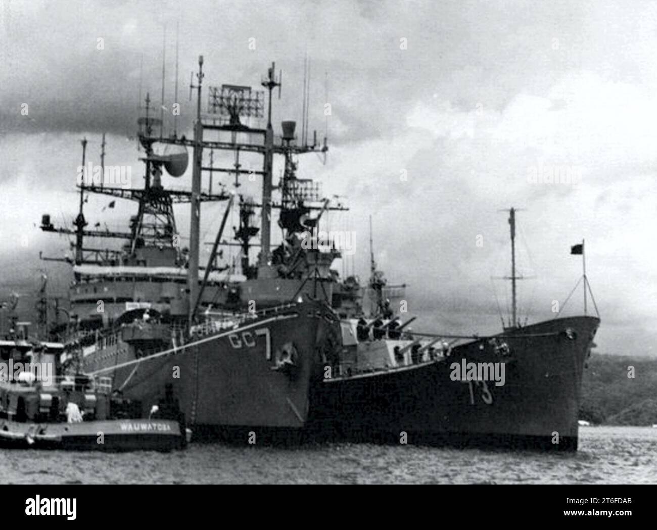 USS Saint Paul (CA-73) and USS Mount McKinley (AGC-7) docked at Naval ...