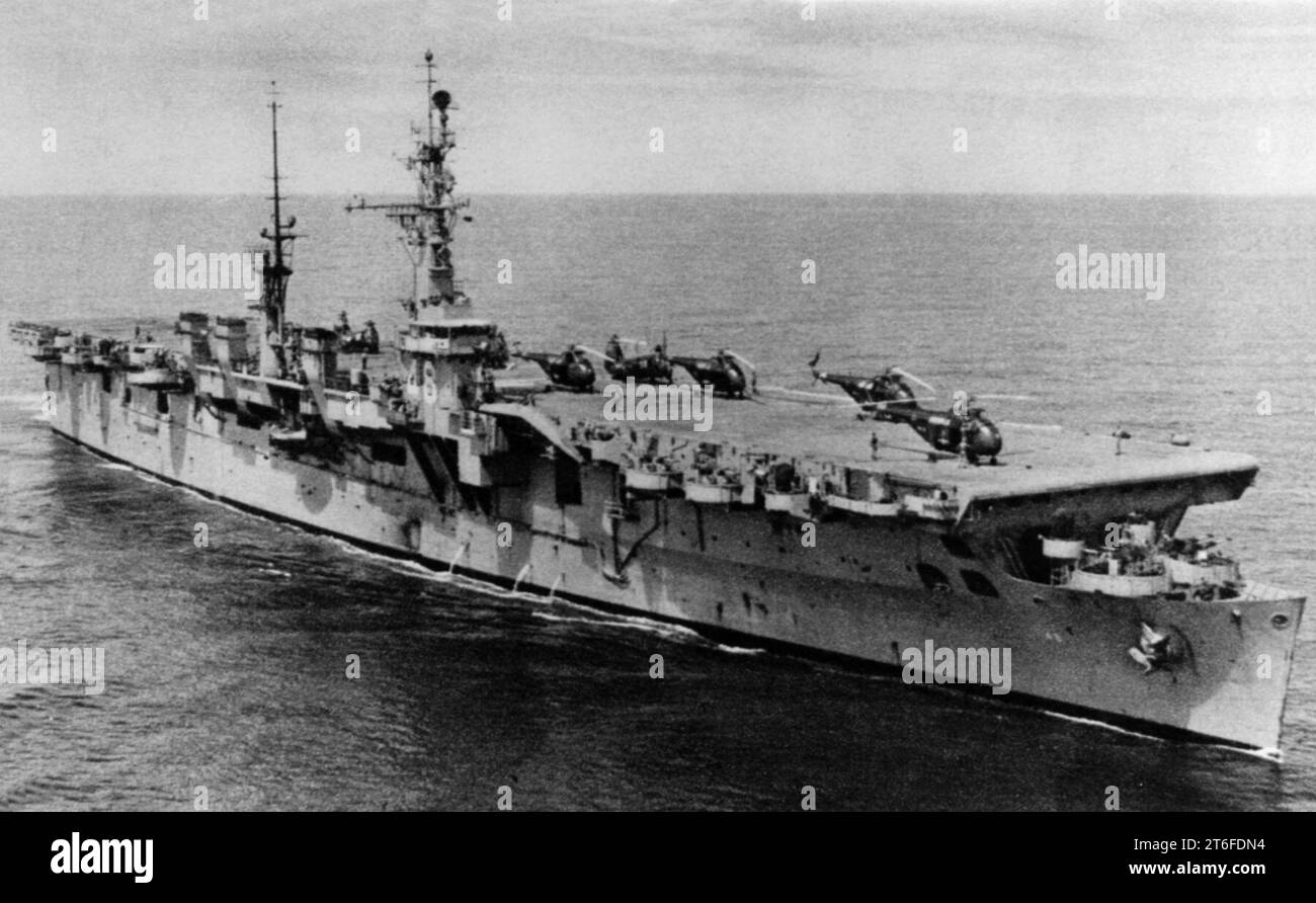 USS Saipan (CVL-48) at sea with helicopters embarked, circa in 1955 ...